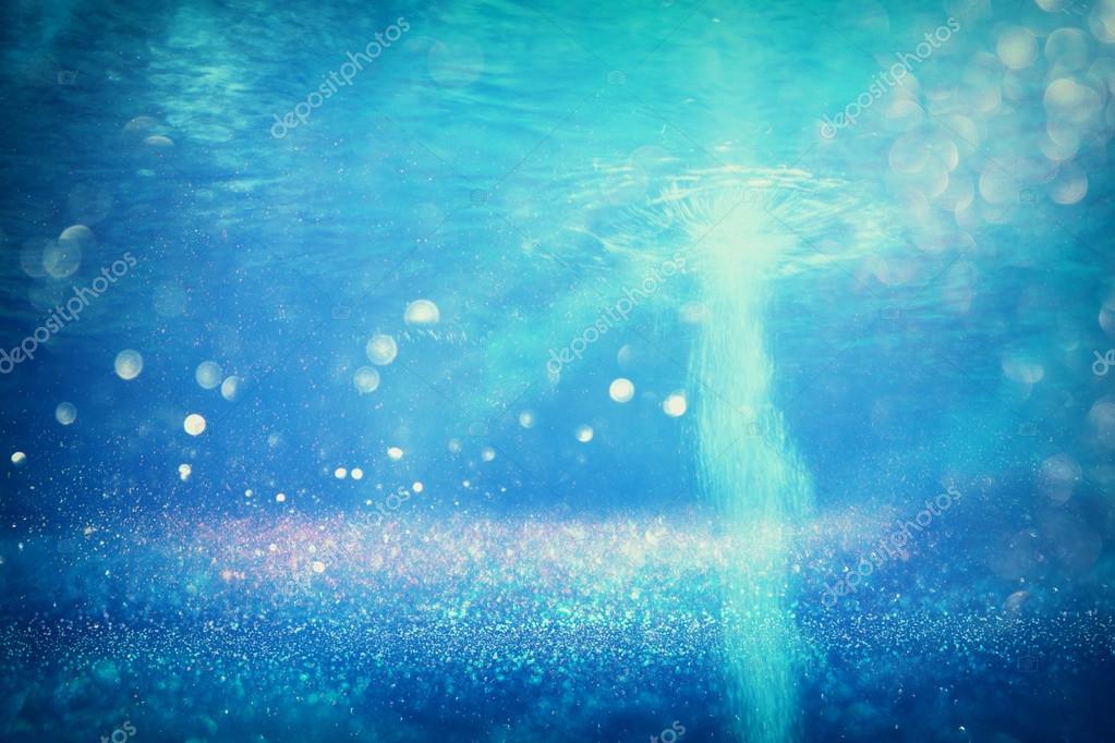 Abstract under the sea background with glitter overlay and textures ...