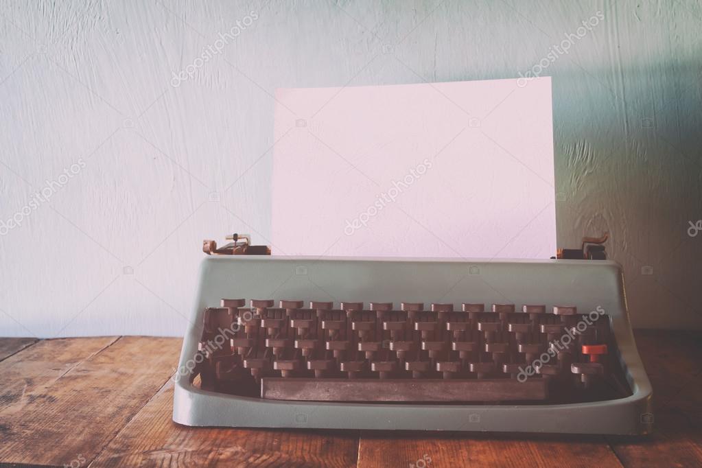 Typewriter With Blank Paper