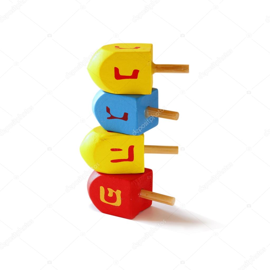 Wooden colorful dreidels (spinning top) for hanukkah jewish holiday ...