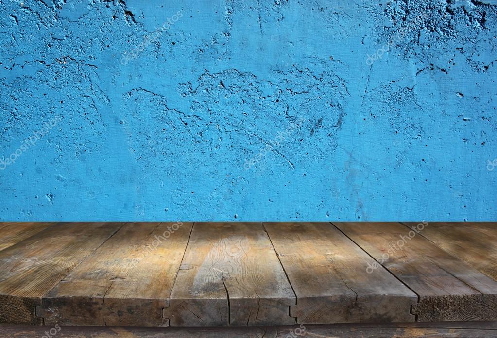 Table and blue background. Stock Photo by ©tomert 86274140