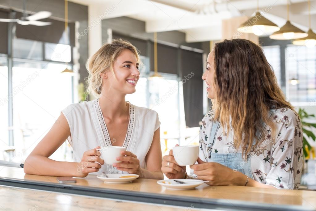 Women talking over coffee Stock Photo by ©ridofranz 115813354