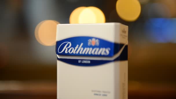 Man pulls Rothmans cigarettes — Stock Video © e_mike #65205521