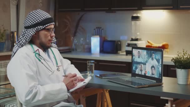 Arabic doctor making zoom video conference with doctors from other ...