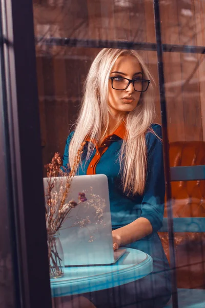 Square photo of sexy secretary working laptop in an office — Stock Photo © ponomarencko #93659594