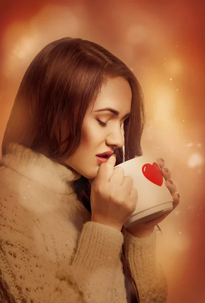 Gorgeous young female drinking tea from cup - Stock Image - Everypixel