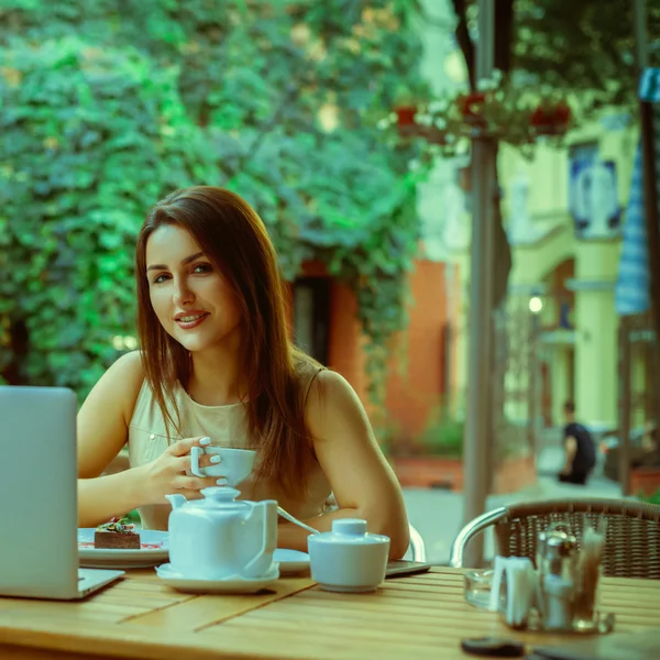 Square photo of sexy secretary working laptop in an office — Stock Photo © ponomarencko #93659594