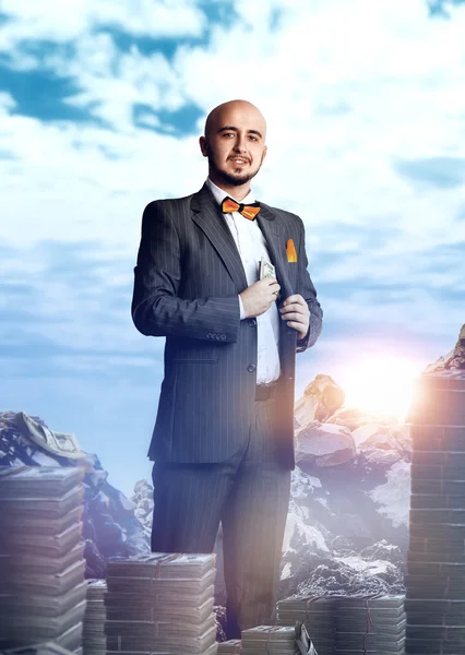 Nice rich man in an expensive suit with a bunch of money around Stock ...