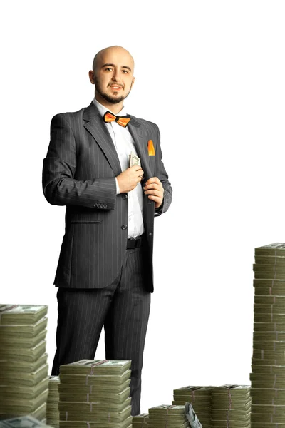 Nice rich man in an expensive suit with a bunch of money around Stock ...