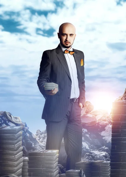 Nice rich man in an expensive suit with a bunch of money around Stock ...