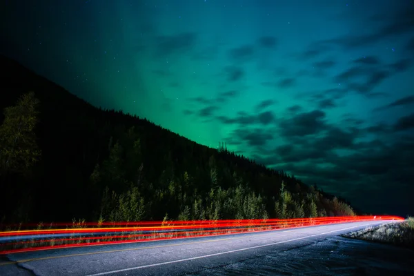 Northern lights highway fotos de stock, imágenes de Northern lights ...