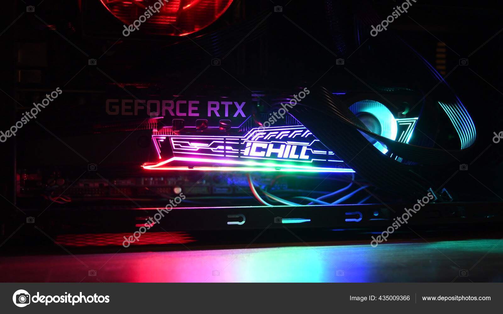 NVidia GeForce RTX 3080 inside gaming PC tower with colorful backlights ...