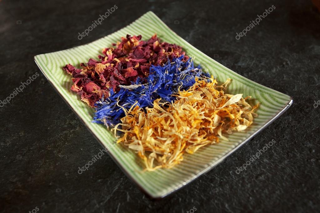 Edible flowers spice background Stock Photo by ©piolka 65815265