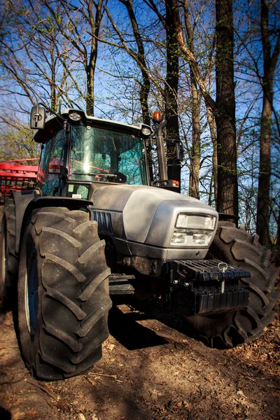 rural tractor in spring - Stock Image - Everypixel