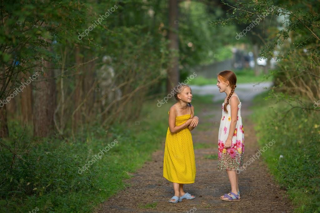 Little girls talking Stock Photo by ©dimaberkut 123571454