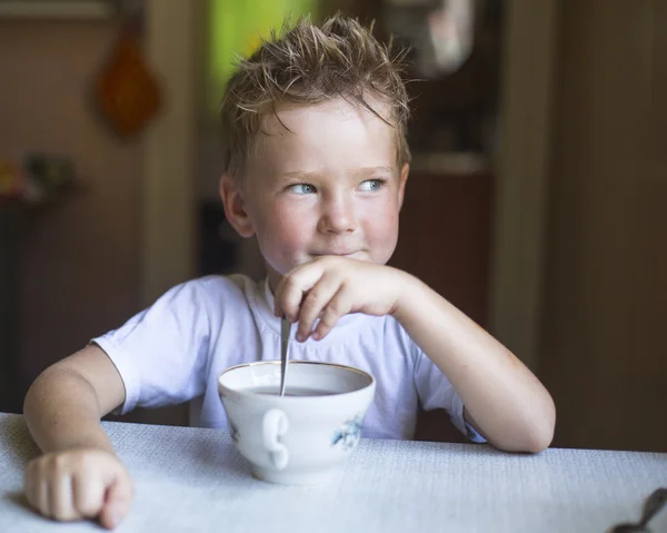 Boy is drinking tea Stock Photos, Royalty Free Boy is drinking tea ...
