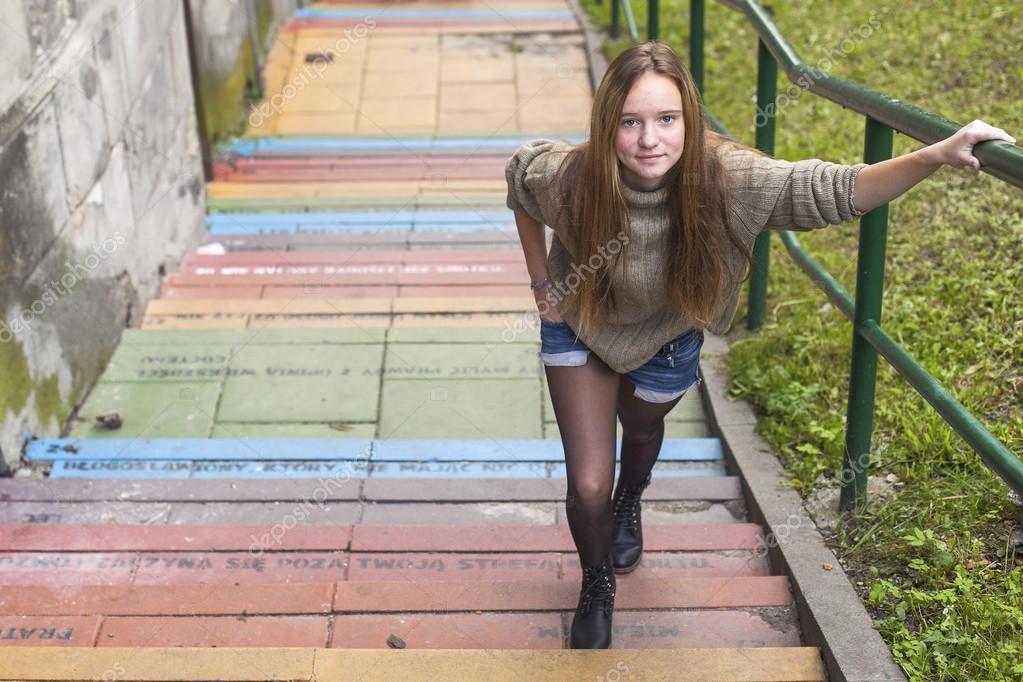 Girl on the stone steps Stock Photo by ©dimaberkut 57030263
