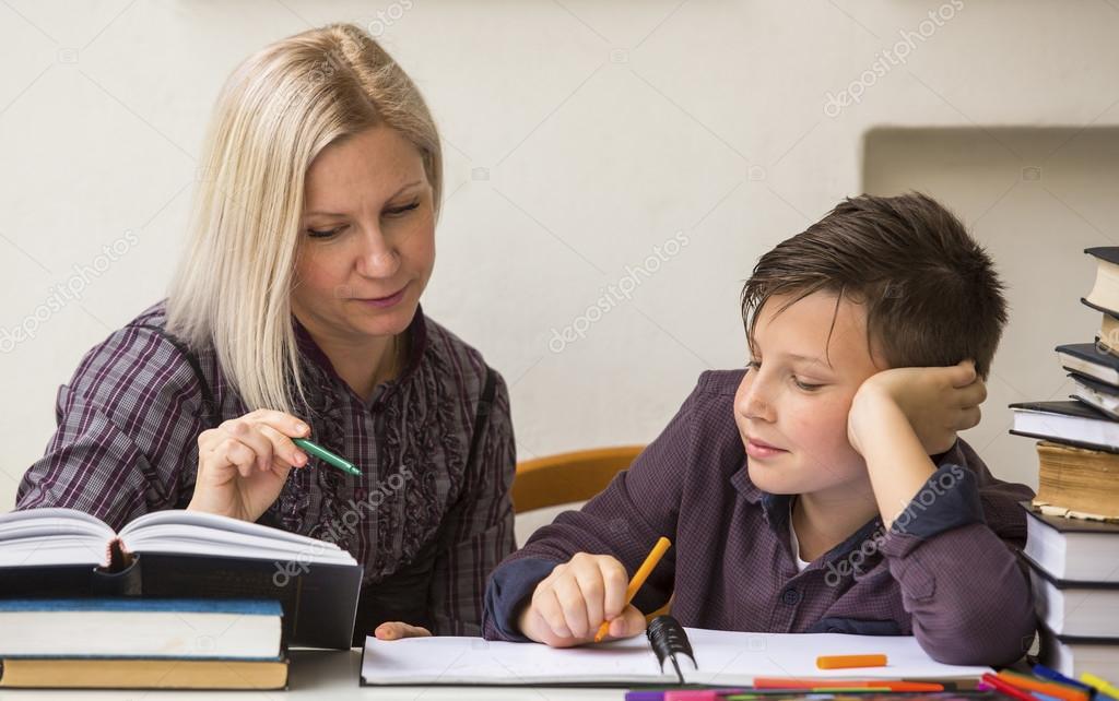 Schoolboy makes engaged homework — Stock Photo © dimaberkut #72053741
