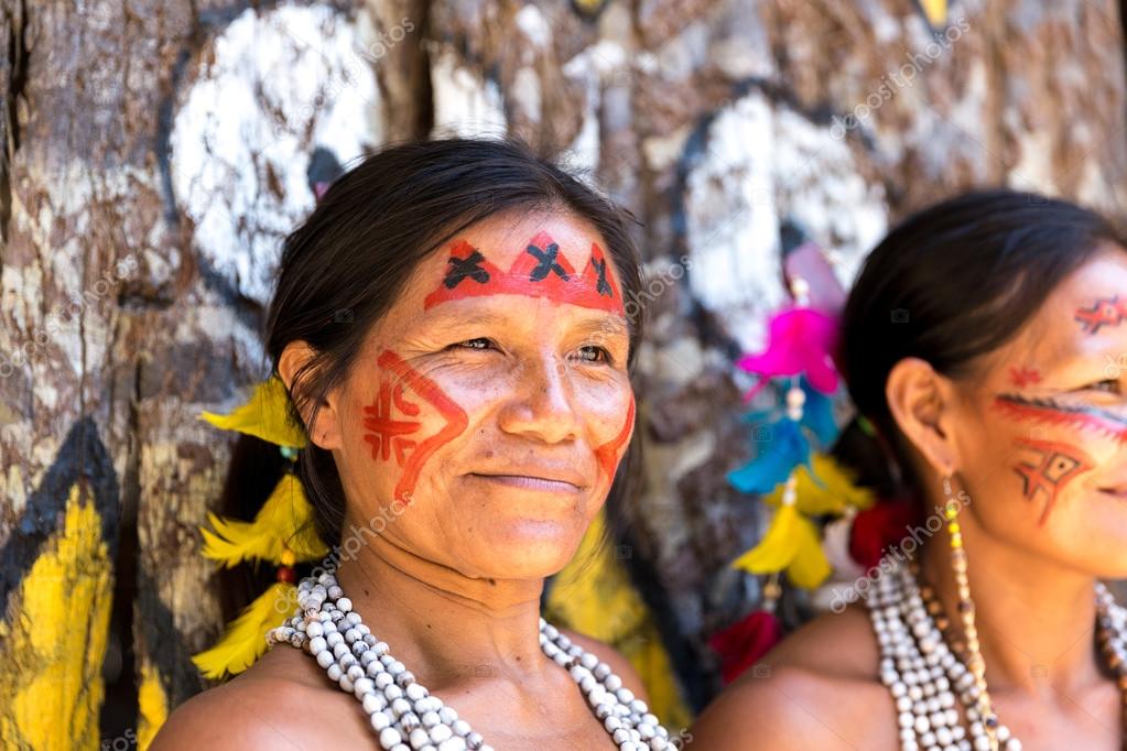 Native Brazilian Woman Smiling At An Indigenous Tribe In The Amazon