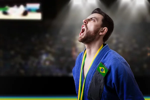 Brazilian judoka fighter in the stadium - Stock Image - Everypixel