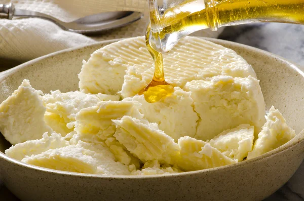 Agave Syrup pouring on Cottage Cheese - Stock Image - Everypixel