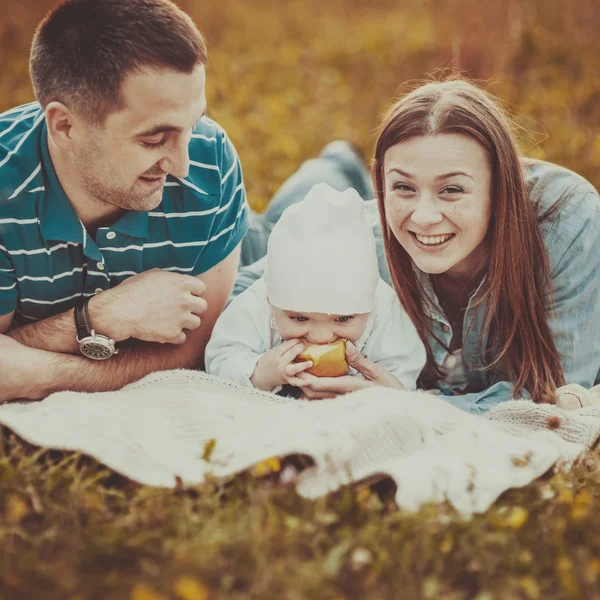 Happy family in sunset light. - Stock Image - Everypixel