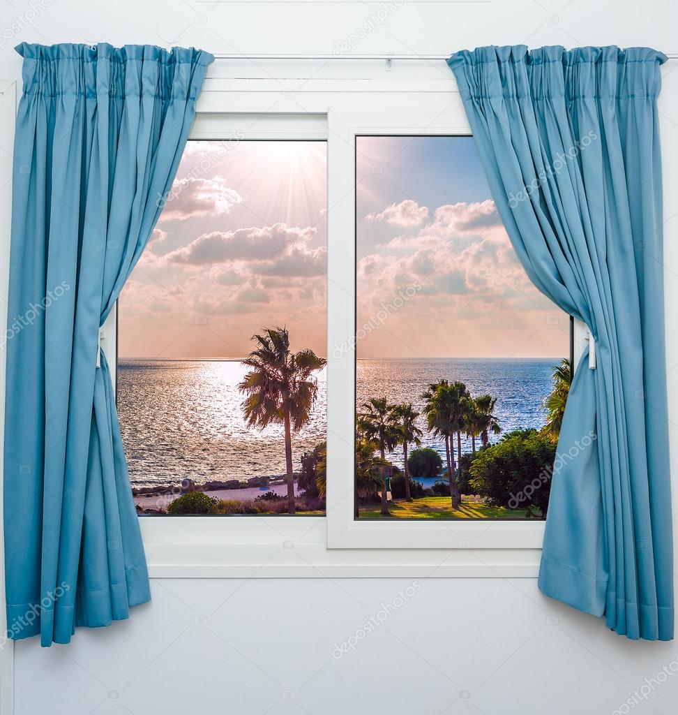 Sea sunset from the window Stock Photo by ©db-rus 59748147