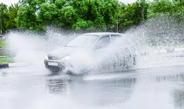 Spray from the car Stock Photo by ©db-rus 12696316