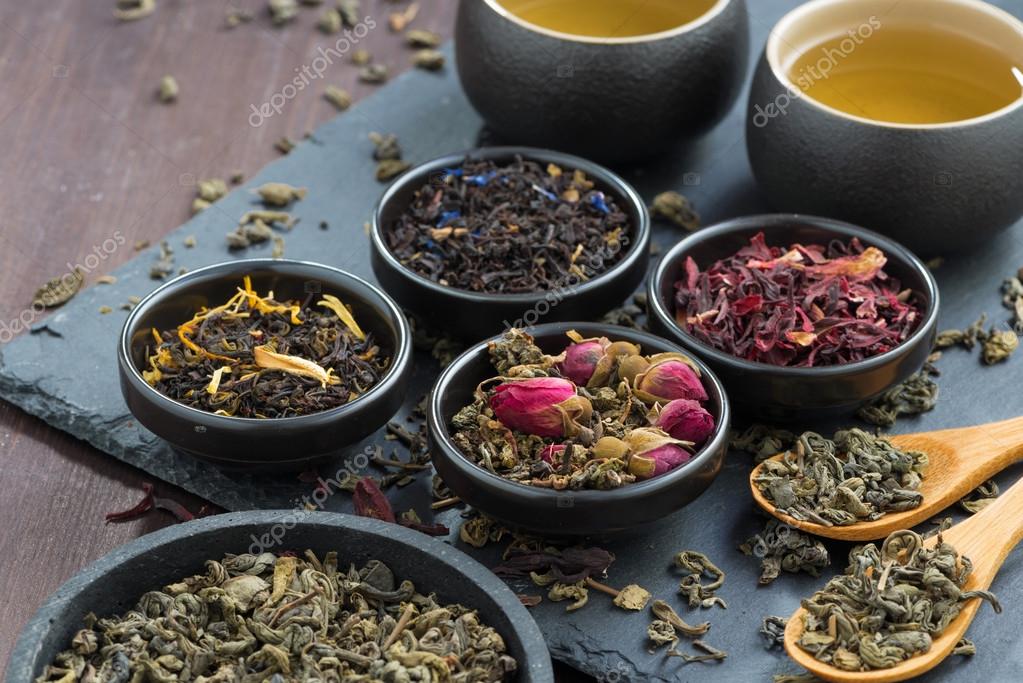 Assortment of fragrant dried teas and green tea, close-up — Stock Photo ...