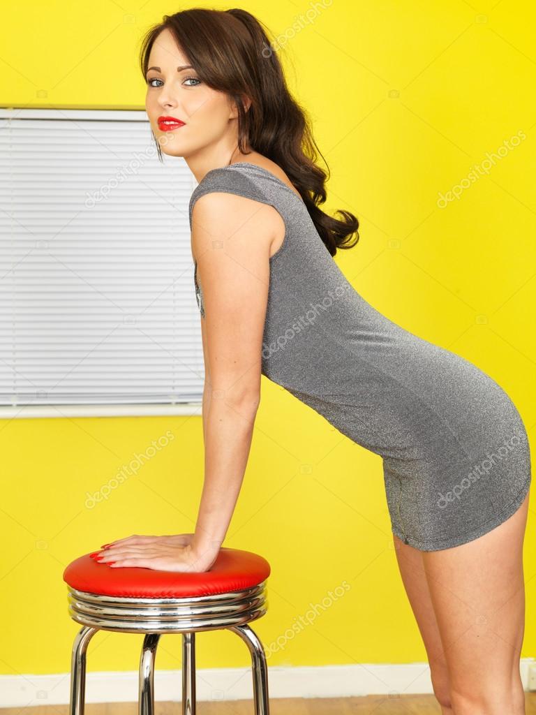 Girls In Short Dresses Bending Over