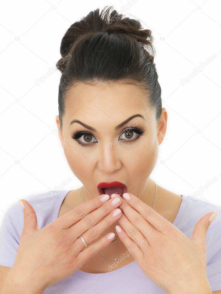 Portrait Of A Very Shocked And Surprised Beautiful Young Hispanic Woman