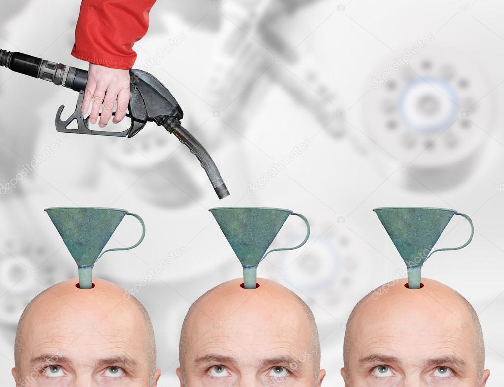 Hairless men's heads with funnels and fuel nozzle — Stock Photo ...