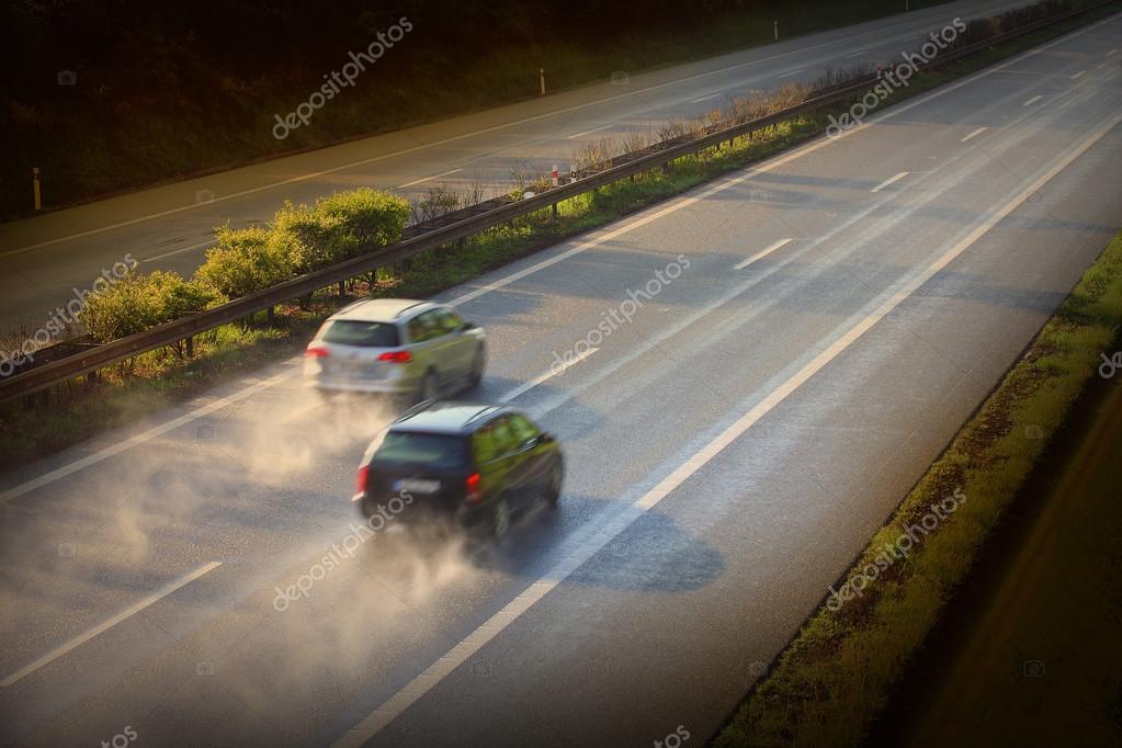 Motion blurred cars on the highway — Stock Photo © vladvitek #65962297