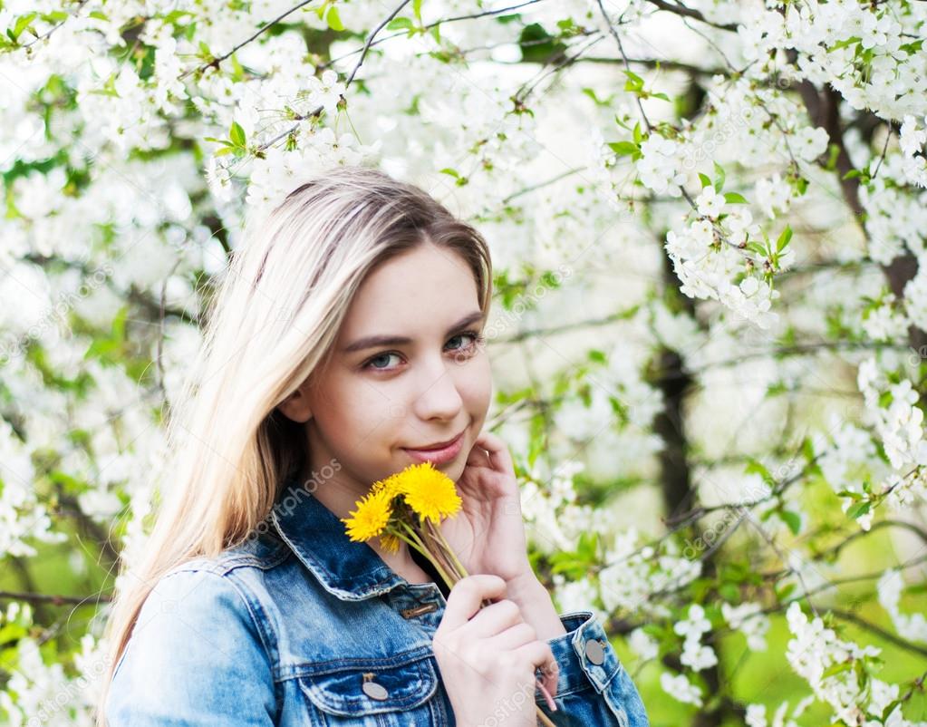 Girl in the spring garden — Stock Photo © ls992007 #107889418