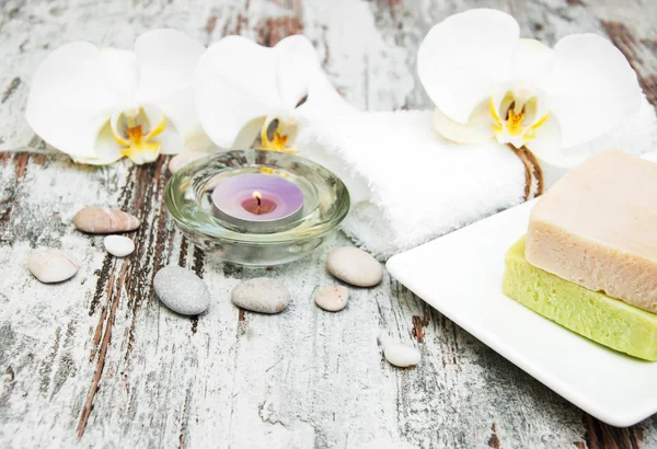 Blooming orchid flower, spa treatment — Stock Photo © belchonock #72909159