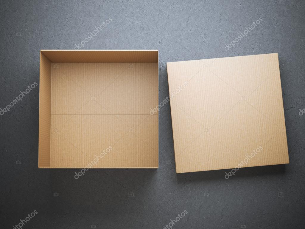 Opened cardboard box with cap — Stock Photo © ekostsov #73931875