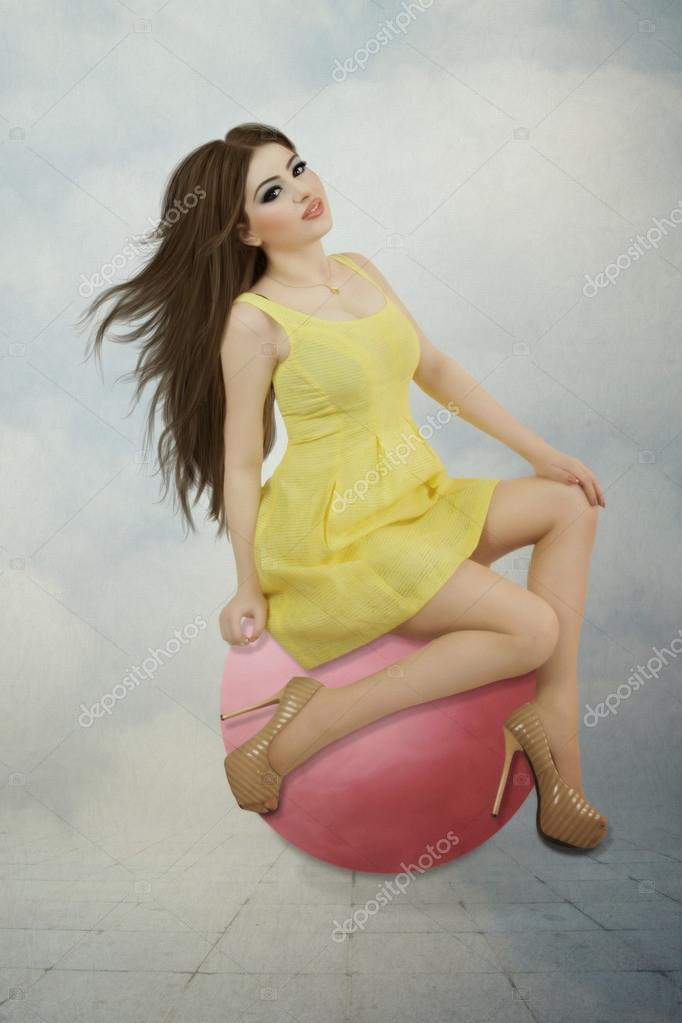 Young girl on the ball Stock Photo by ©Margo1956 65746607