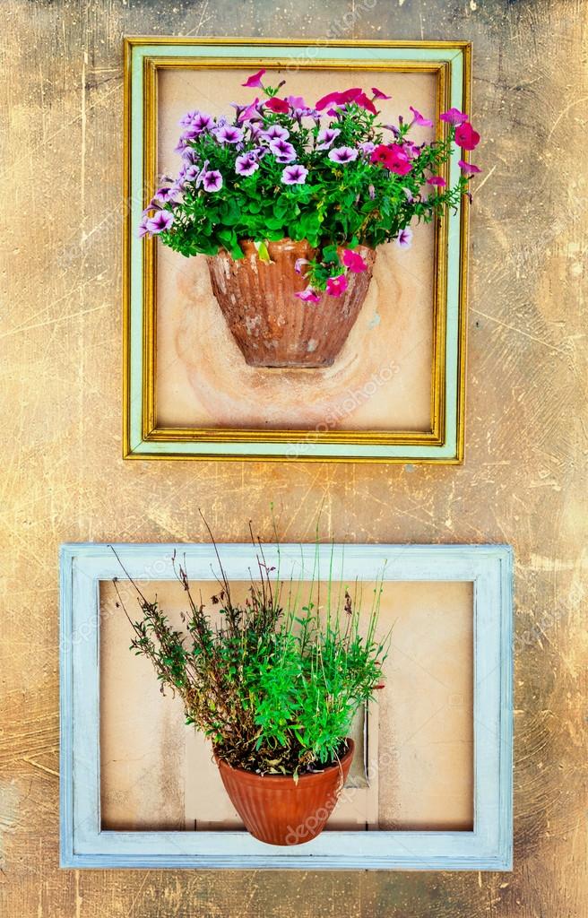 Floral art - empty frames with floral pots on the wall — Stock Photo ...