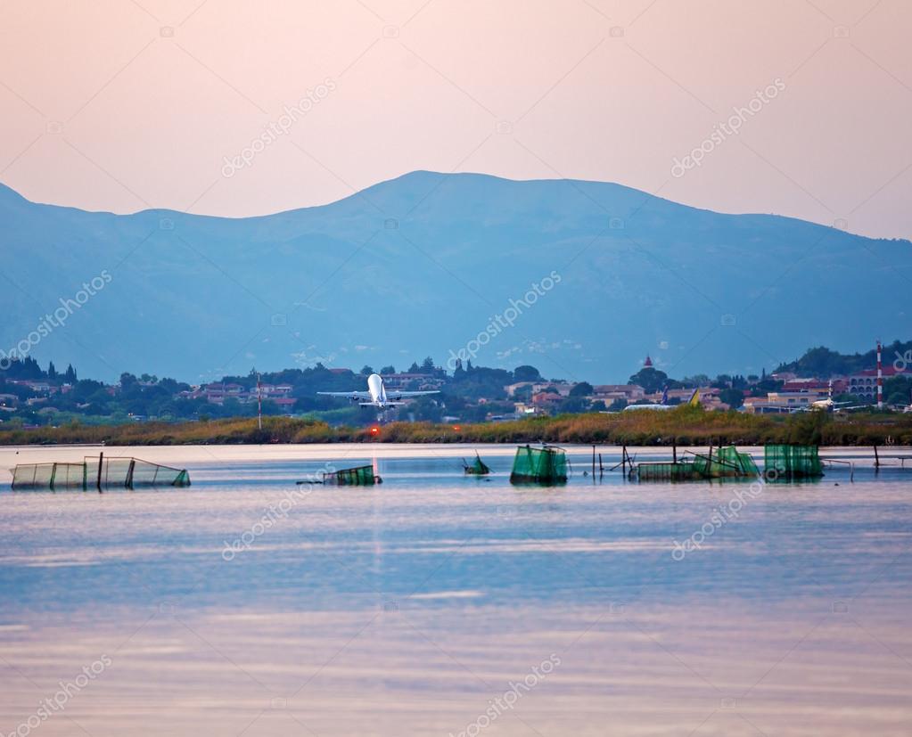 Airplane Take-off at Corfu Airport — Stock Photo © Rostislavv #85014138