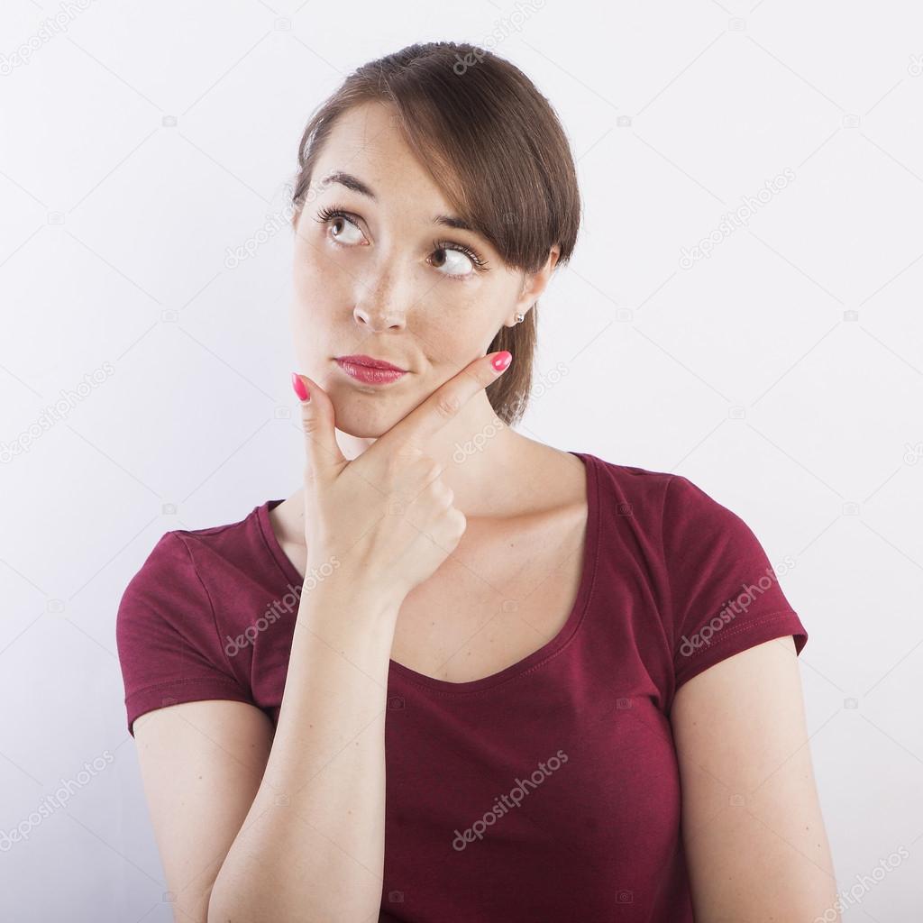 Woman thinking with hand on chin Stock Photo by ©tommasolizzul 85120694 Woman thinking with hand on chin Stock Photo by ©tommasolizzul 85120694