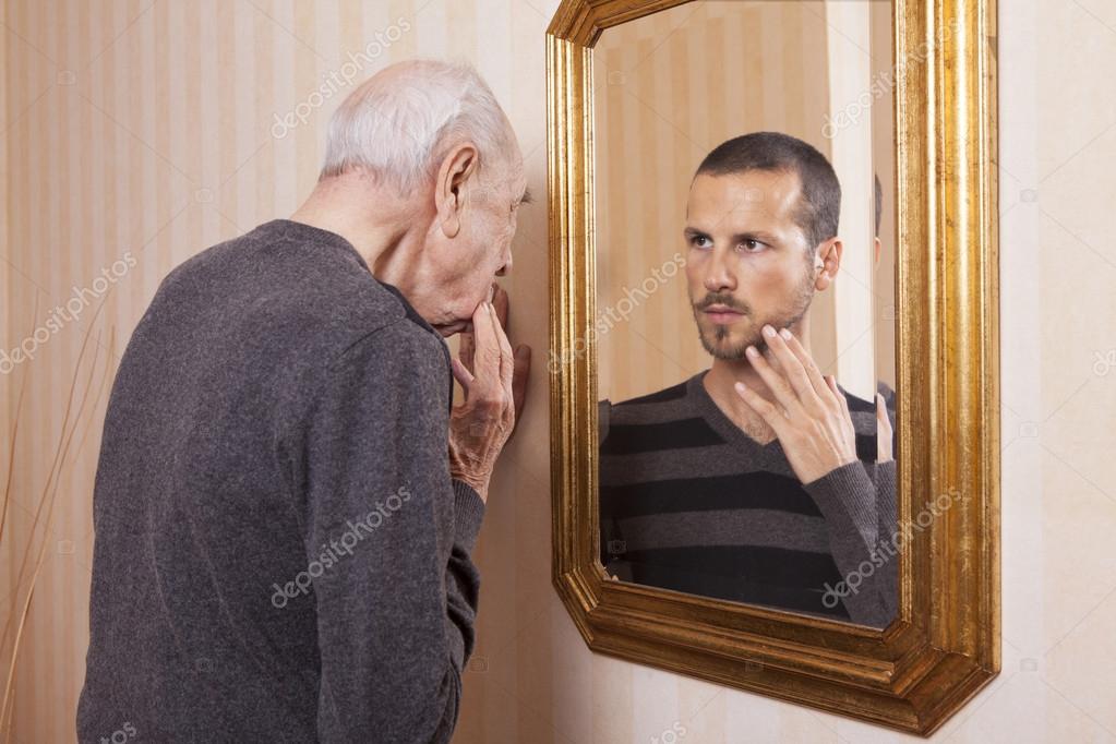 Old man looking at young himself — Stock Photo © tommasolizzul #85132584 Old man looking at young himself — Stock Photo © tommasolizzul #85132584