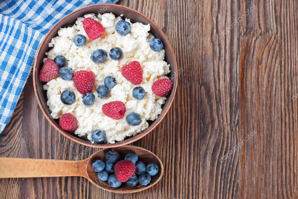 Cottage cheese with berries Stock Photo by ©insanity 81478960