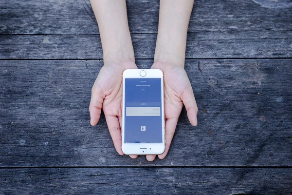 CHIANG RAI, THAILAND - SEPTEMBER 13, 2015: Woman try to log in page ...