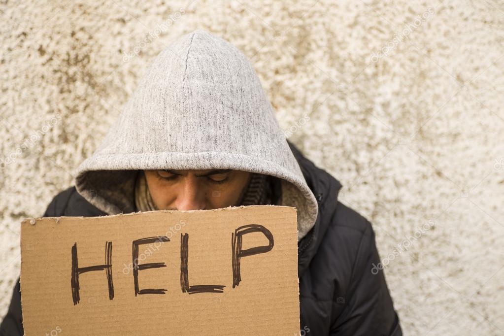Young guy with cardboard sign seeking help Stock Photo by ©Premium ...