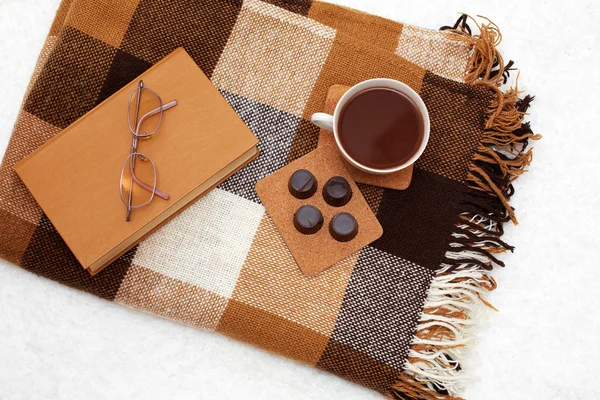 Cozy winter home background, cup of hot cocoa and chocolate, boo ...