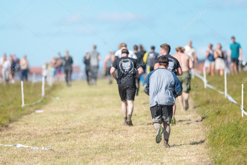 Running between the obstacles at the Tough Viking event at Garde ...