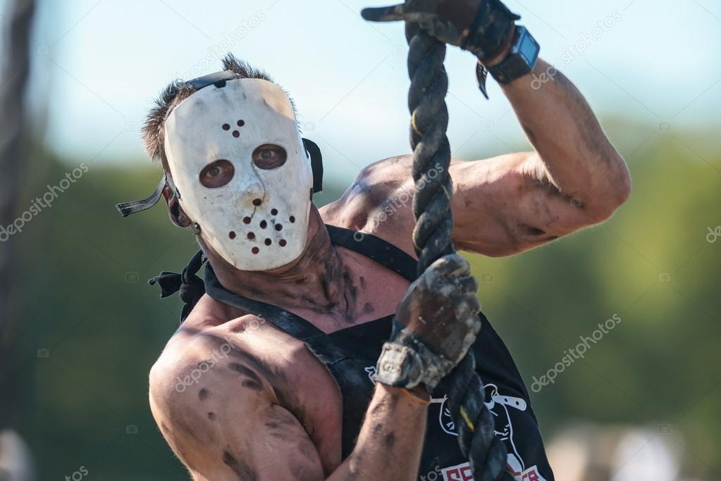Scary man with Jason mask at the Rope climb at the Tough Viking – Stock ...
