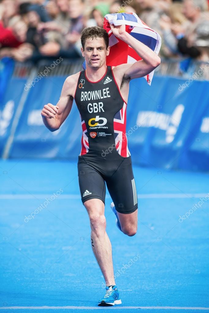 Winner Jonathan Brownlee crossing the finish line and win the Me ...