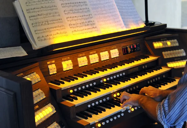 Hands of Someone playing Organ Stock Photo by ©aetb 53494043