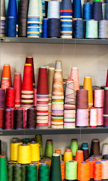 Colorful Cotton Thread Spools on Shelf - Stock Image - Everypixel