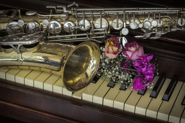 Flowers Saxophone Piano Stock Photo by ©ezumeimages 104774894